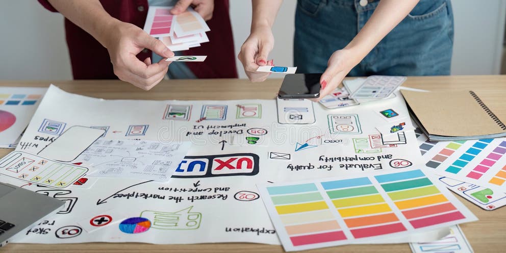 Collaborative Design Process. Two Young Professionals Brainstorming and ...