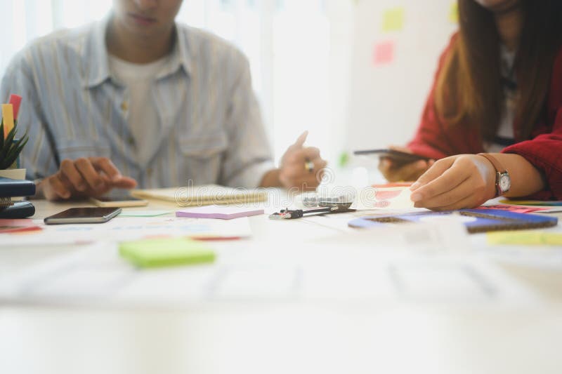 Creative Team Collaborating on App Development Project at Modern ...