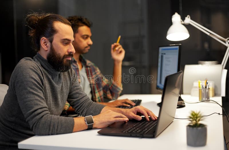 Creative Team with Computer Working Late at Office Stock Image - Image ...