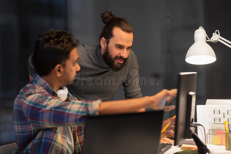 Creative Team with Computer Working Late at Office Stock Image - Image ...