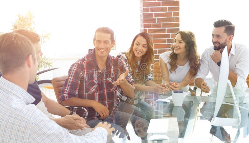 Creative Team Discussing Business Issues Sitting Stock Photo - Image of ...