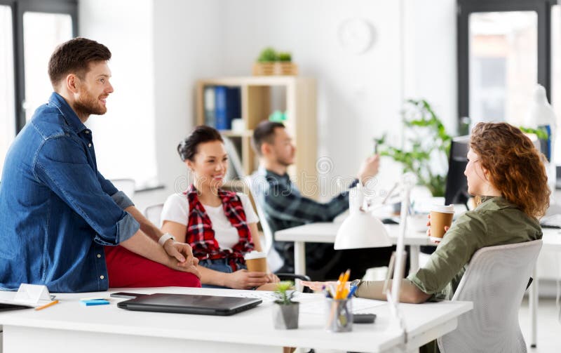 Creative Team Drinking Coffee at Office Stock Image - Image of happy ...