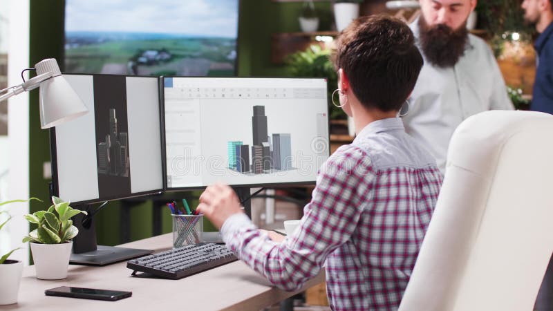 Creative Team of Engineer and Architect Talking about New Building ...