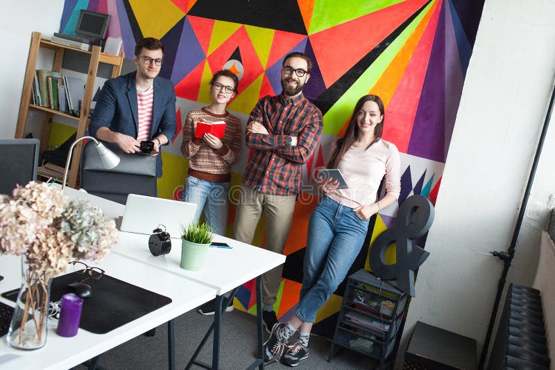 Creative Team of Four Colleagues Working in Modern Office Stock Image ...