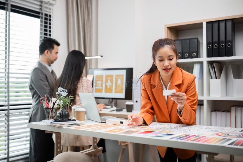 Creative Team of Graphic Designers Collaborating in Modern Office To ...