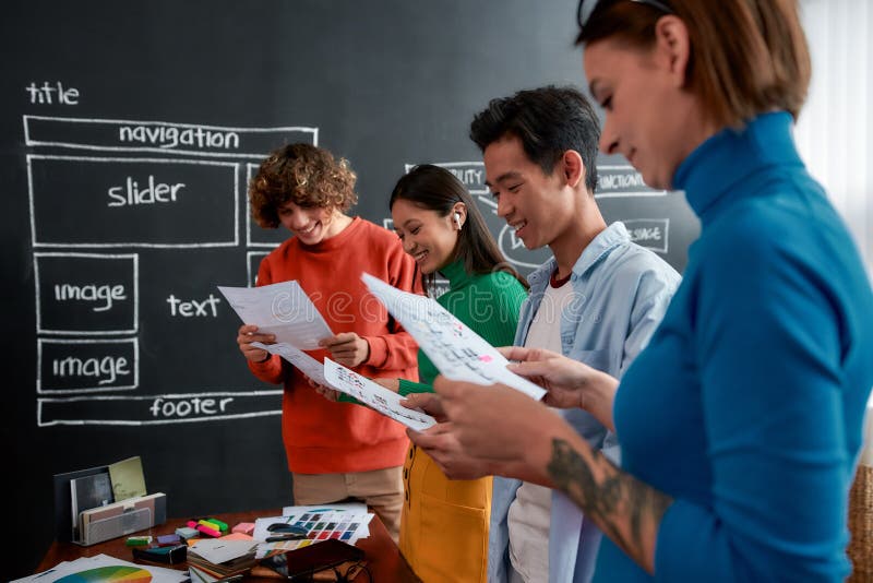 Creative Team. Group of Four Cheerful Web Designers in Casual Wear ...