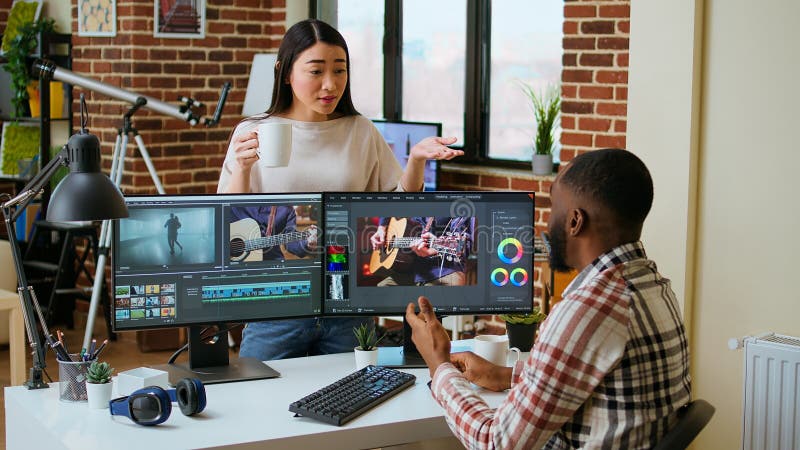 Creative Team Interracial Partners Collaborating on a Video Editing ...