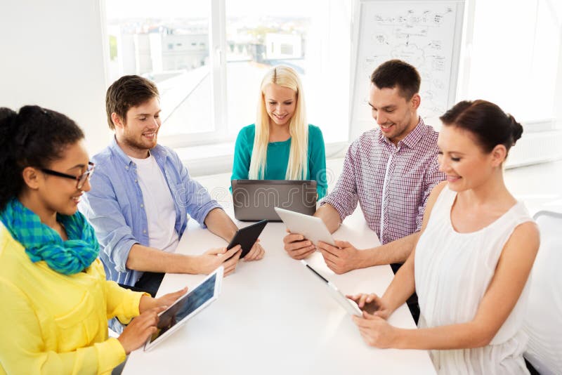 Creative Team with Table Computers in Office Stock Image - Image of ...