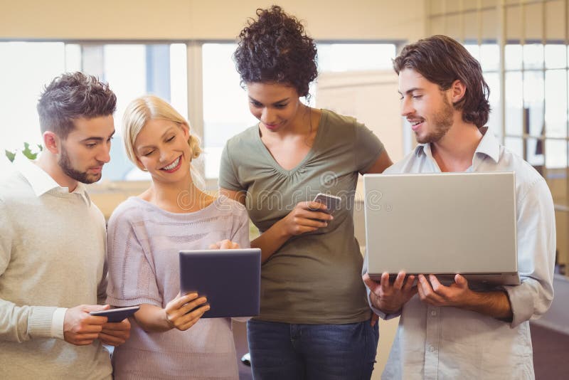 Creative Team Using Tablet Pc in Office Stock Photo - Image of male ...