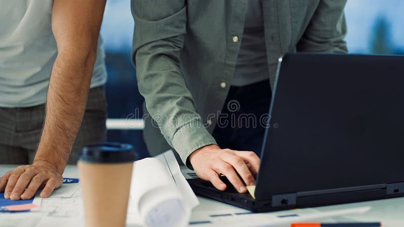 Creative Team at Work. Team Work. Man Working on Laptop. Workspace ...