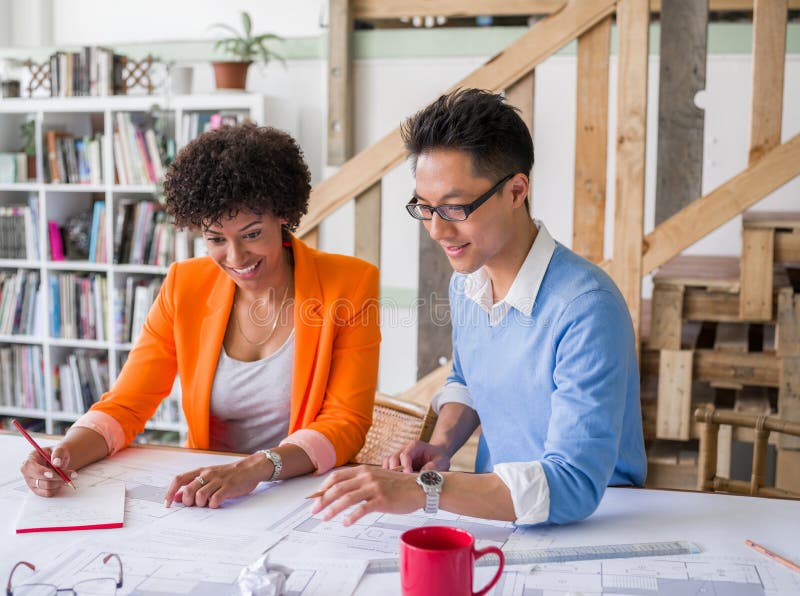Creative team at work stock image. Image of pointing - 55898771