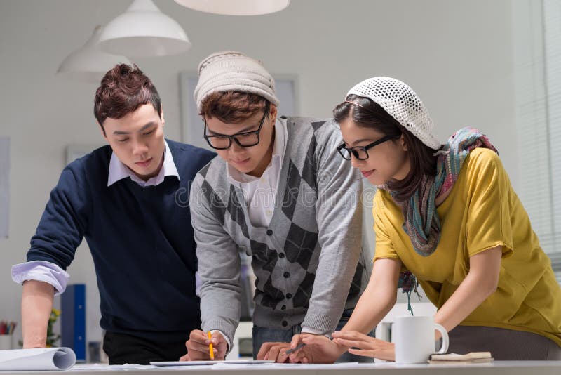 Creative team at work stock image. Image of teamwork - 52086333