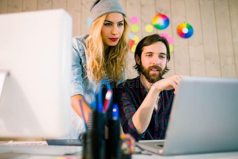 Creative Team Working at Desk Stock Photo - Image of happy, cheerful ...