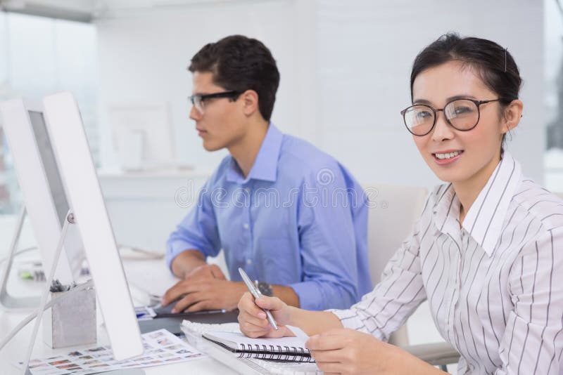 Creative Team Working at Desk Stock Image - Image of mixedrace, career ...