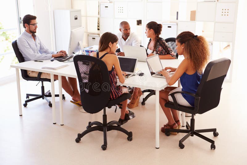 Creative Team Working in Office of Start Up Business Stock Photo ...