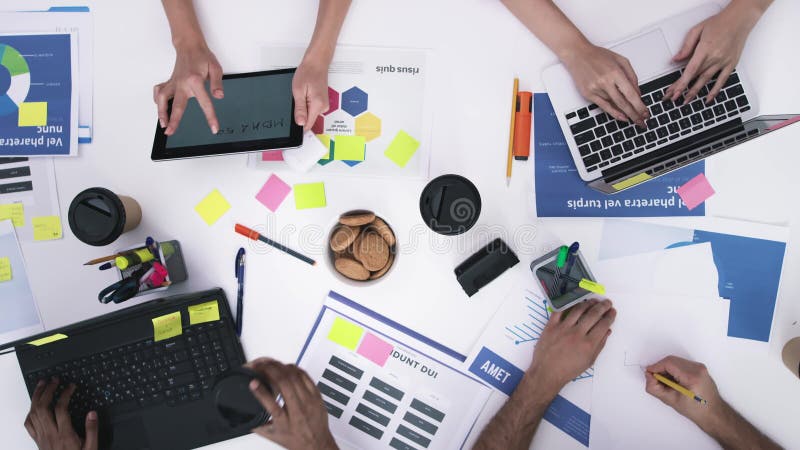 Creative Team Office Work. Up Down View on Table. People Working. Shot ...