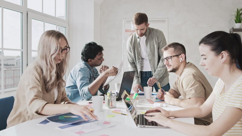 Creative Team Working at Office. Team Making Presentation. Team Work at ...