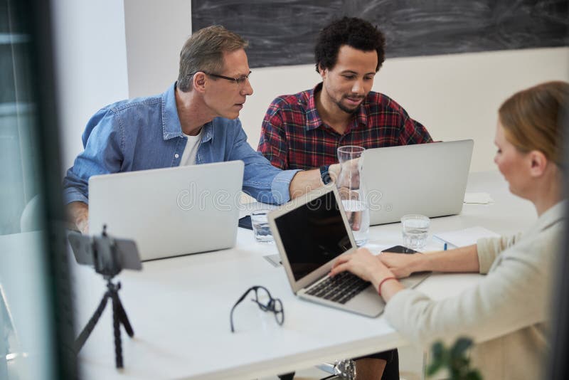 Creative Team Working on Project in Office Stock Photo - Image of ...