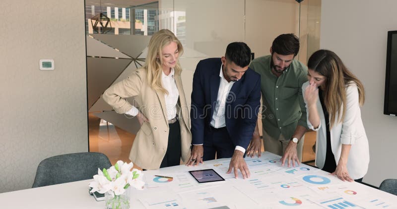 Creative Team Working on Project Strategy Together, Analyzing Papers ...