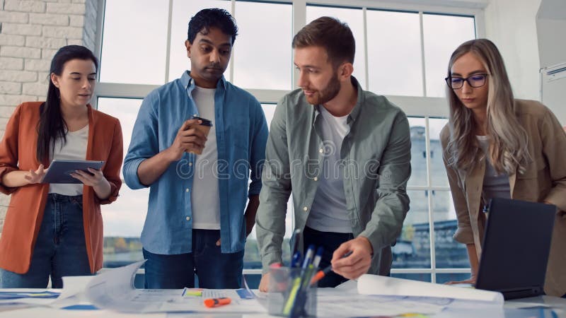 Indian Man Explaning Project To His Team. Creative Team Working at ...