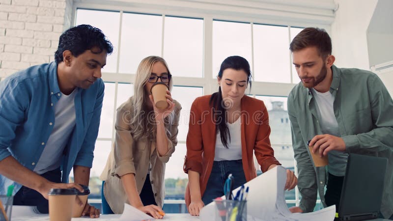 Creative Team Working on Table. Creative Office Work. Team Discussing ...