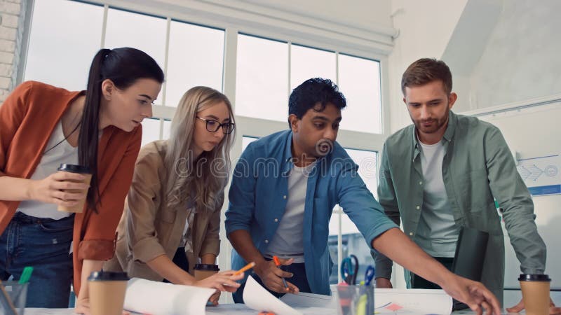 Creative Team Working on Table. Creative Office Work. Team Discussing ...