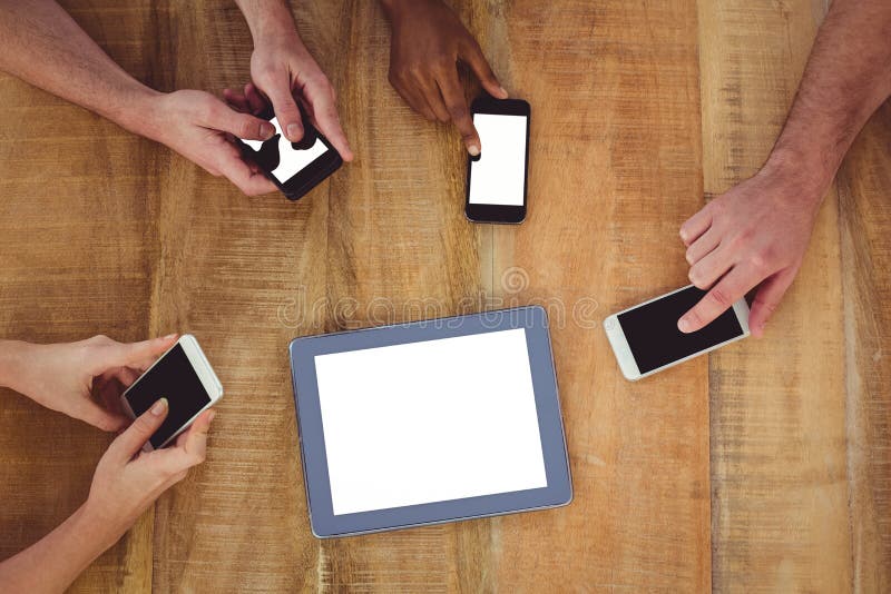 Creative Team Working Together on a Tablet and Smartphones Stock Photo ...