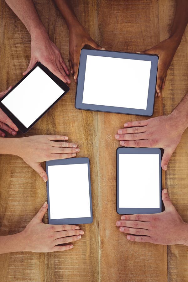 Creative Team Working Together on a Tablet and Smartphones Stock Image ...