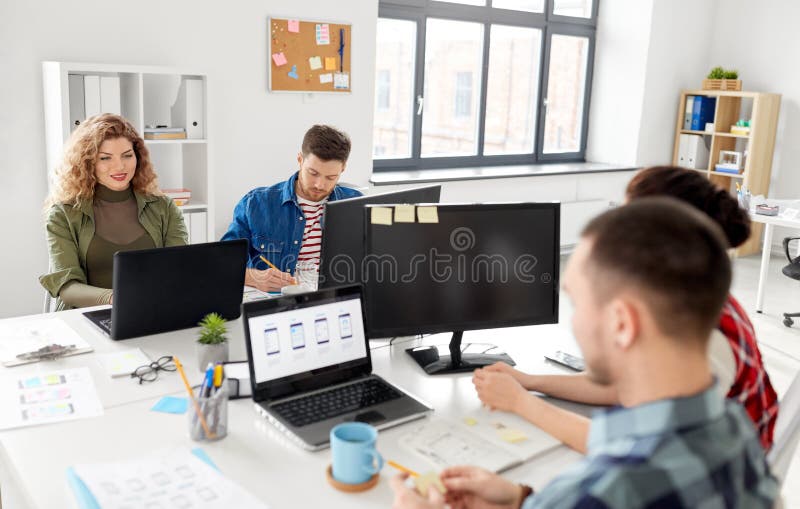 Creative Team Working on User Interface at Office Stock Photo - Image ...
