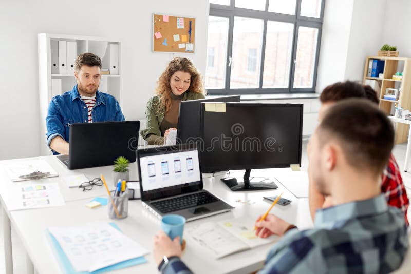 Creative Team Working on User Interface at Office Stock Photo - Image ...