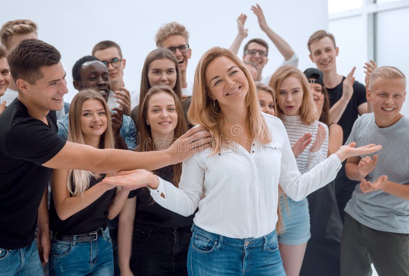 Creative Team of Young People Congratulating Their Leader Stock Photo ...