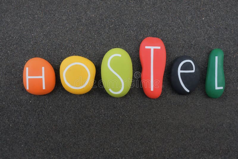 Hostel, Creative Text Composed with Multi Colored Stone Letters Over ...