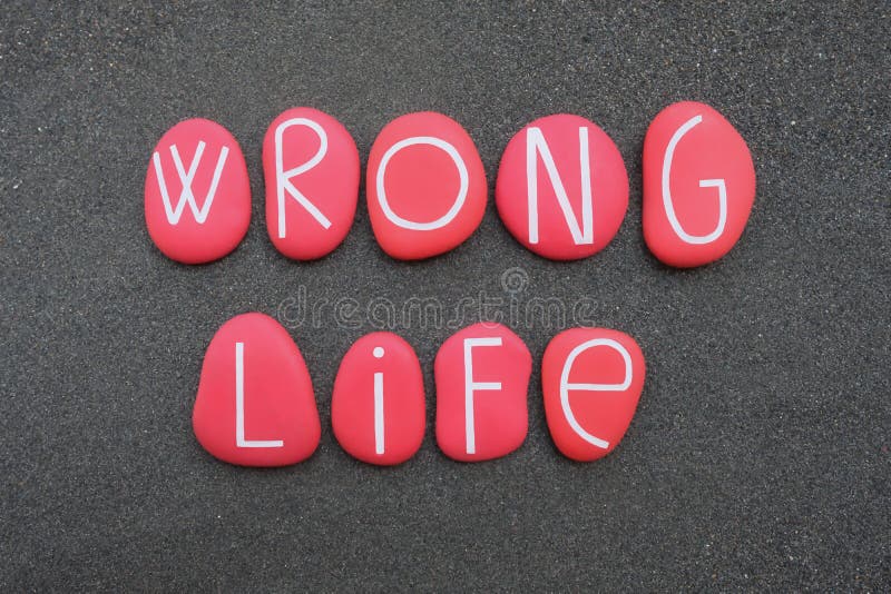 Wrong Life Text Composed with Red Colored Stone Letters Over Volcanic ...