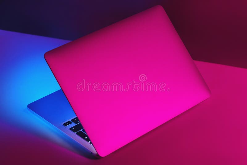 Creative Version of an Half Opened Laptop Computer with Purple and Blue ...