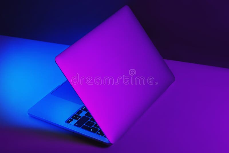 Creative Version of an Half Opened Laptop Computer with Purple and Blue ...