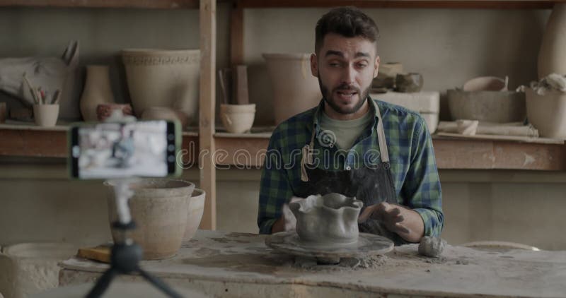 Creative Vlogger Recording Tutorial about Pottery Talking and Shaping ...