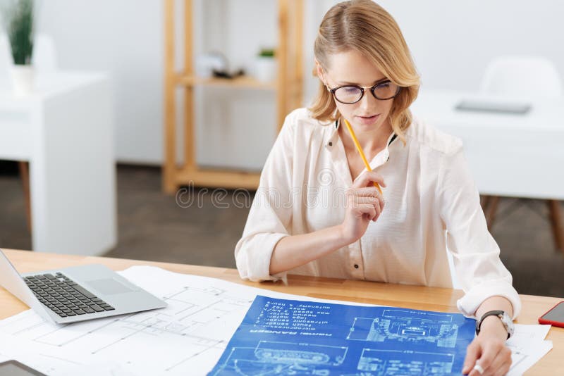 Creative Woman Investigating the Engineering Project at Work Stock ...