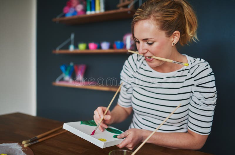 Creative woman painting stock image. Image of designer - 108110643