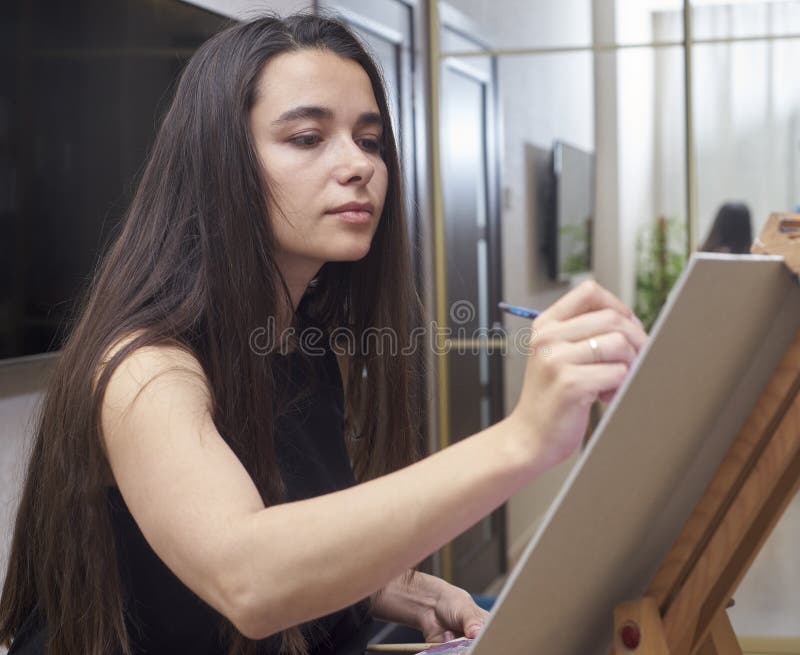 Creative Woman Paints a Portrait on Canvas Stock Photo - Image of ...