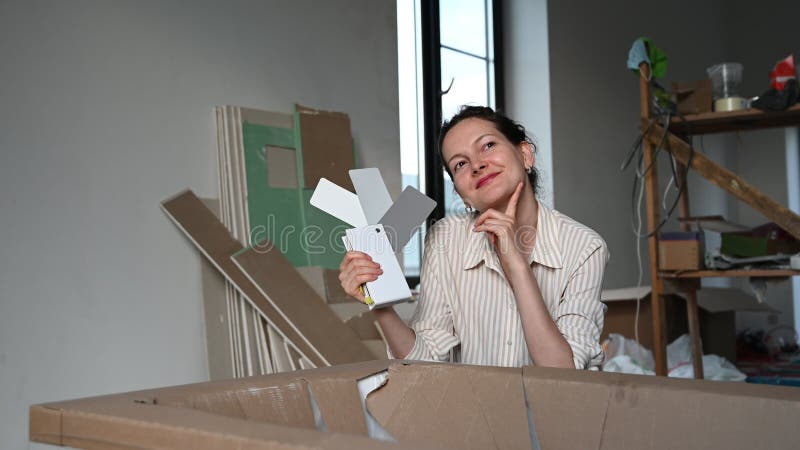Creative Woman Selecting Paint Colors in Studio Setting Stock Footage ...
