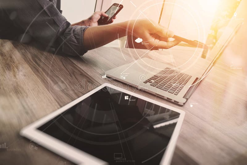 Creative Working with Mobile Phone and Digital Tablet and Laptop Stock ...