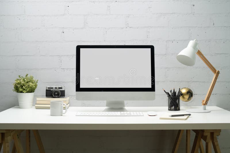 Creative Workspace with Blank Computer Desktop, Lamp, Camera and Potted ...