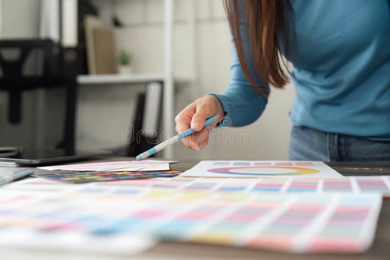 Design Process and Color Selection. a Designer Carefully Evaluates ...