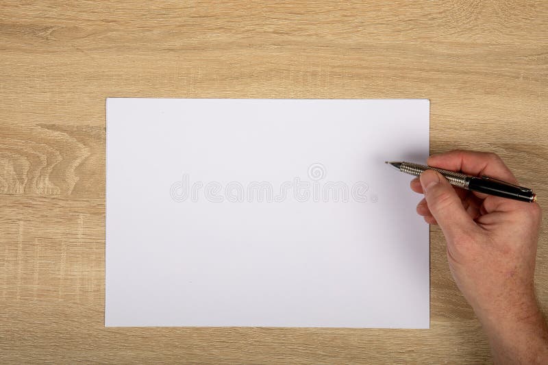 Creative Workspace: Top-Down View of Hand Drawing with Pen on ...