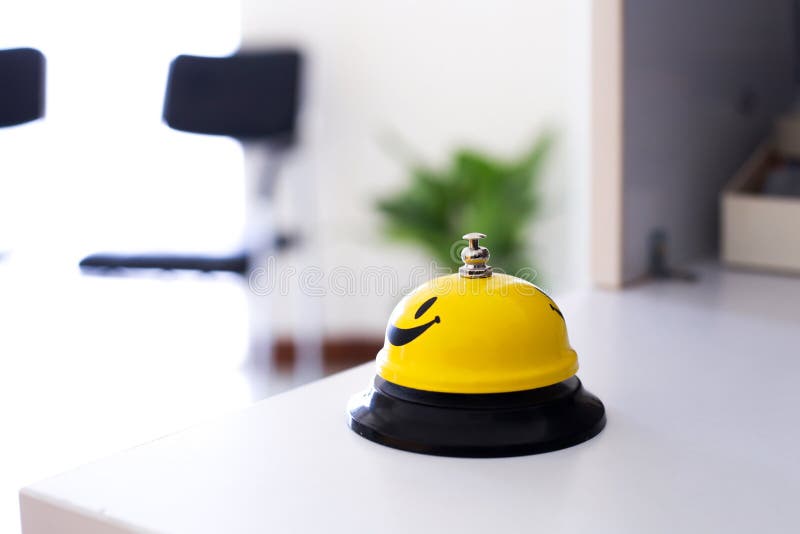 Creative Yellow Smiley Bell on Table, Smiley Bell Stock Photo - Image ...