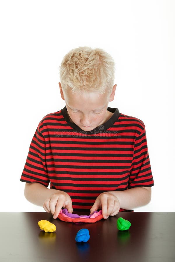 Creative Young Boy Playing Plastic Putty Stock Photos - Free & Royalty ...