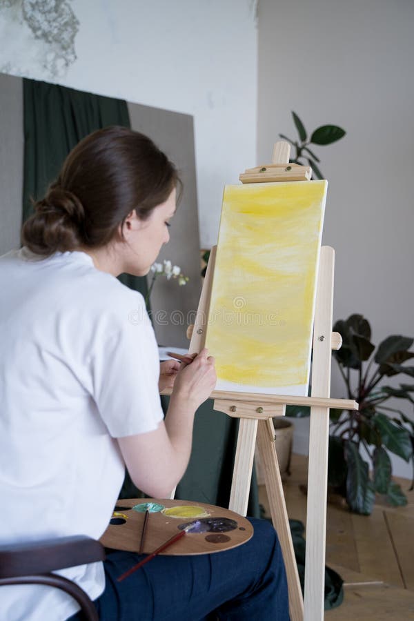 A Creative Young Entrepreneur. Artist Works in a Creative Workshop ...