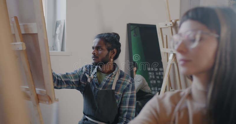 Creative Young People Art Students Working in Studio Painting Artworks ...