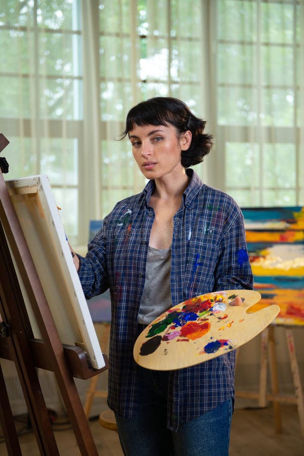 Creative Young Woman Painter Working on a New Artwork for Her Project ...