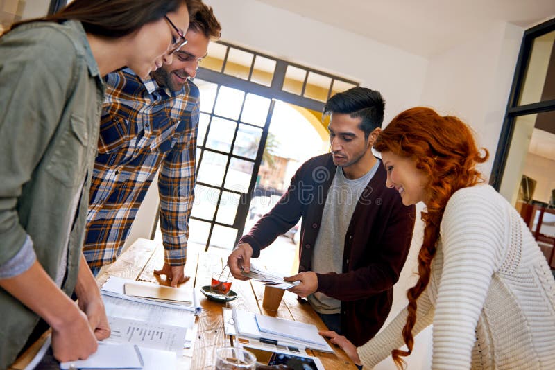 Creatives at Work. a Team of Young Designers Working Together in Their ...